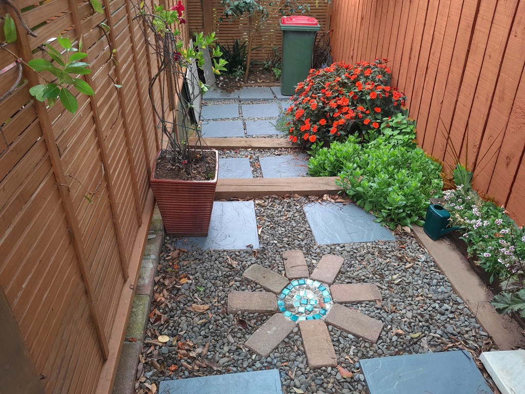 creative small space back path | Waikanae Watch